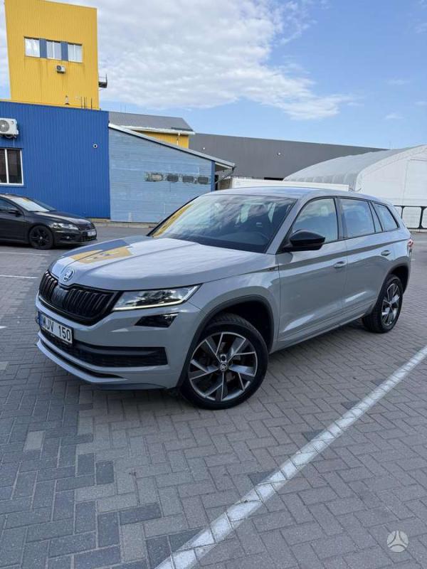 Pelēks Skoda Kodiaq 2018 Kauņa, ar dzinēja tilpumu 1.97 L un nobraukumu 255 tūkst. km par 18900 €, foto 1 vietnē AUTOMOTO.COM.LV