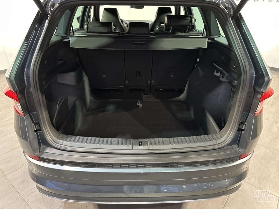 Grey Skoda Kodiaq 2021 in Kaunas, with an engine capacity of 1.50 L and mileage of 82 thousand km for 31411 €, photo 6 on AUTOMOTO.COM.LV