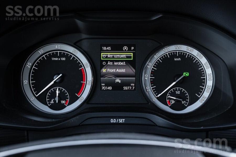 Grey Skoda Kodiaq 2021 in Riga, with an engine capacity of 1.50 L and mileage of 70 thousand km for 23650 €, photo 15 on AUTOMOTO.COM.LV