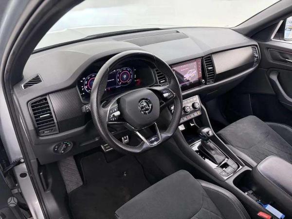 Grey Skoda Kodiaq 2021 in Vilnius, with an engine capacity of 1.50 L and mileage of 192 thousand km for 19360 €, photo 6 on AUTOMOTO.COM.LV