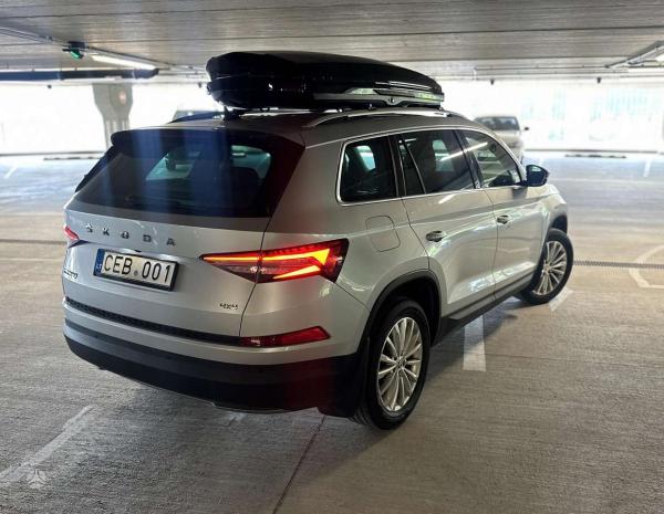 Grey Skoda Kodiaq 2022 in Vilnius, with an engine capacity of 1.97 L and mileage of 93 thousand km for 28900 €, photo 4 on AUTOMOTO.COM.LV