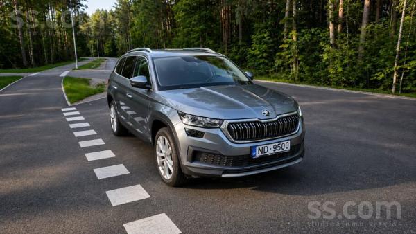 Grey Skoda Kodiaq 2022 in Riga, with an engine capacity of 2.00 L and mileage of 87 thousand km for 26800 €, photo 1 on AUTOMOTO.COM.LV
