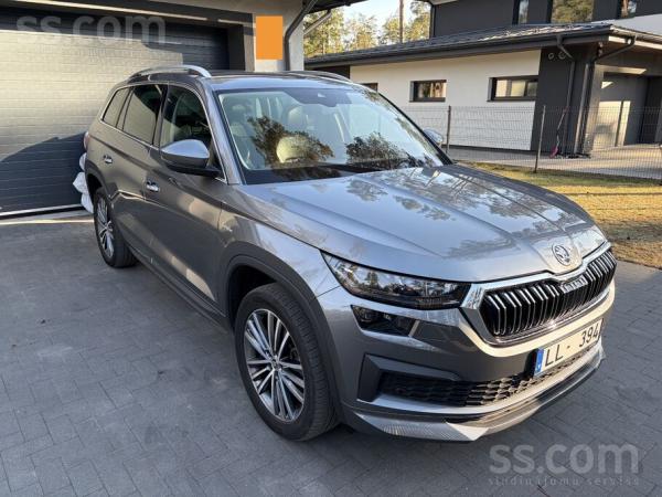 Grey Skoda Kodiaq 2023 in Riga, with an engine capacity of 2.00 L and mileage of 83 thousand km for 32900 €, photo 1 on AUTOMOTO.COM.LV