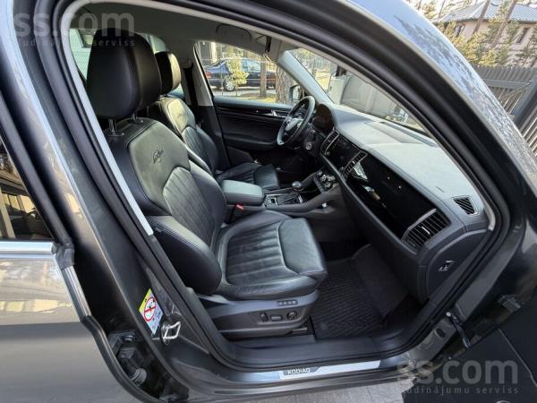 Grey Skoda Kodiaq 2023 in Riga, with an engine capacity of 2.00 L and mileage of 83 thousand km for 32900 €, photo 4 on AUTOMOTO.COM.LV