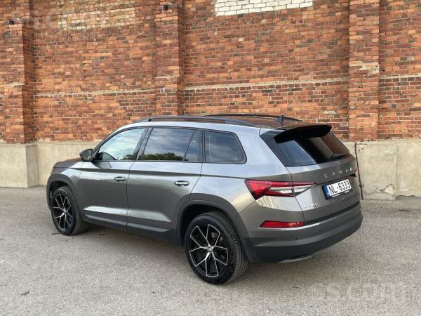 Grey Skoda Kodiaq 2023 in Riga, with an engine capacity of 1.50 L and mileage of 72 thousand km for 25900 €, photo 7 on AUTOMOTO.COM.LV