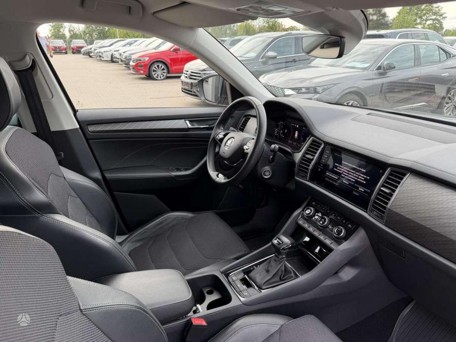 Grey Skoda Kodiaq 2023 in Siauliai, with an engine capacity of 1.97 L and mileage of 191 thousand km for 24990 €, photo 17 on AUTOMOTO.COM.LV