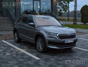 Grey Skoda Kodiaq 2023 in Riga, with an engine capacity of 2.00 L and mileage of 74 thousand km for 34000 €, photo  on AUTOMOTO.COM.LV