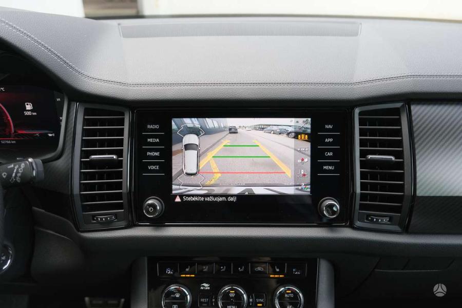 Grey Skoda Kodiaq 2024 in Vilnius, with an engine capacity of 1.98 L and mileage of 53 thousand km for 39400 €, photo 16 on AUTOMOTO.COM.LV