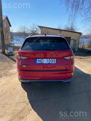 Red Skoda Kodiaq 2022 in Ogre, with an engine capacity of 2.00 L and mileage of 100 thousand km for 26500 €, photo 7 on AUTOMOTO.COM.LV