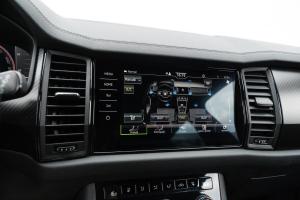 Red Skoda Kodiaq 2023 in Riga, with an engine capacity of 2.00 L and mileage of 73 thousand km for 33450 €, photo 13 on AUTOMOTO.COM.LV