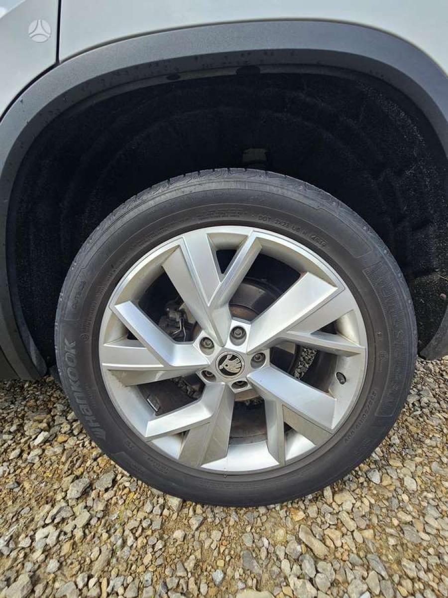 White Skoda Kodiaq 2017 in Vilnius, with an engine capacity of 1.97 L and mileage of 267 thousand km for 18900 €, photo 14 on AUTOMOTO.COM.LV
