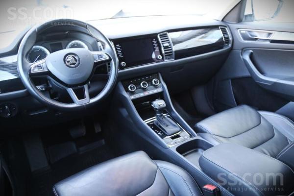 White Skoda Kodiaq 2017 in Riga, with an engine capacity of 2.00 L and mileage of 225 thousand km for 15995 €, photo 8 on AUTOMOTO.COM.LV
