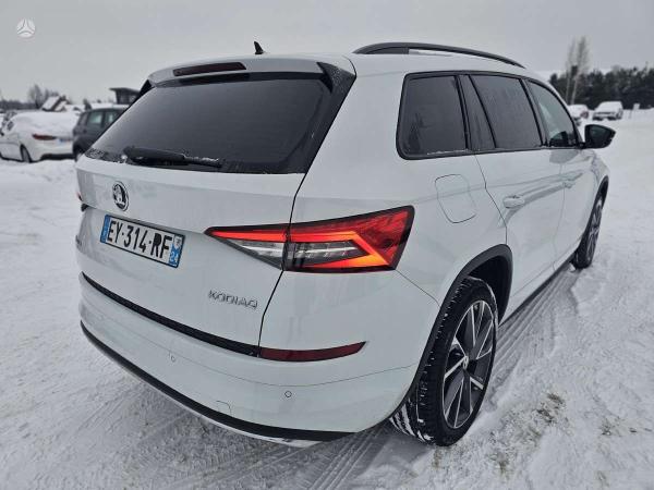 White Skoda Kodiaq 2018 in Taurage, with an engine capacity of 2.00 L and mileage of 328 thousand km for 14200 €, photo 6 on AUTOMOTO.COM.LV
