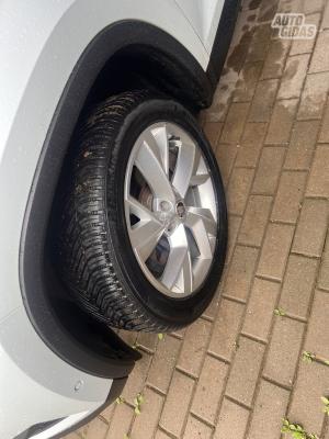 White Skoda Kodiaq 2018 in Kaunas, with an engine capacity of 2.00 L and mileage of 234 thousand km for 18350 €, photo 17 on AUTOMOTO.COM.LV