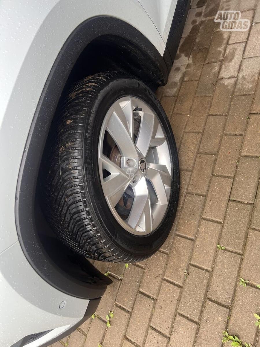 White Skoda Kodiaq 2018 in Kaunas, with an engine capacity of 2.00 L and mileage of 234 thousand km for 18350 €, photo 17 on AUTOMOTO.COM.LV