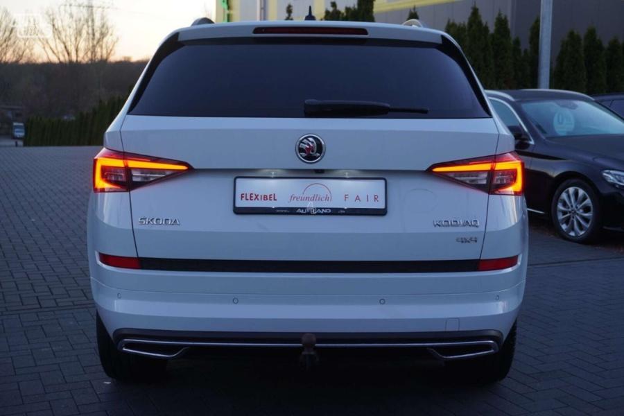 White Skoda Kodiaq 2019 in Kaunas, with an engine capacity of 2.00 L and mileage of 90 thousand km for 31660 €, photo 4 on AUTOMOTO.COM.LV