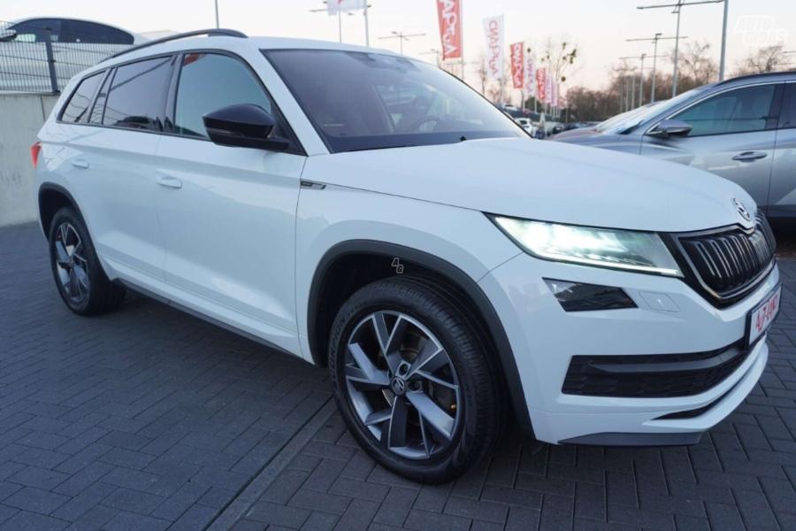 White Skoda Kodiaq 2019 in Kaunas, with an engine capacity of 2.00 L and mileage of 90 thousand km for 31660 €, photo 6 on AUTOMOTO.COM.LV
