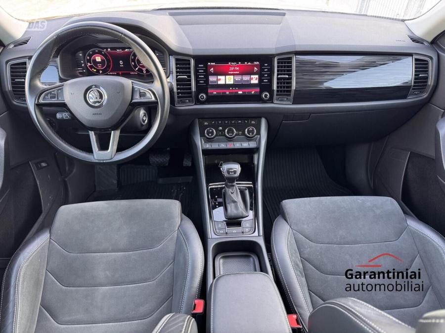 White Skoda Kodiaq 2019 in Avizieniai, with an engine capacity of 2.00 L and mileage of 128 thousand km for 22950 €, photo 7 on AUTOMOTO.COM.LV