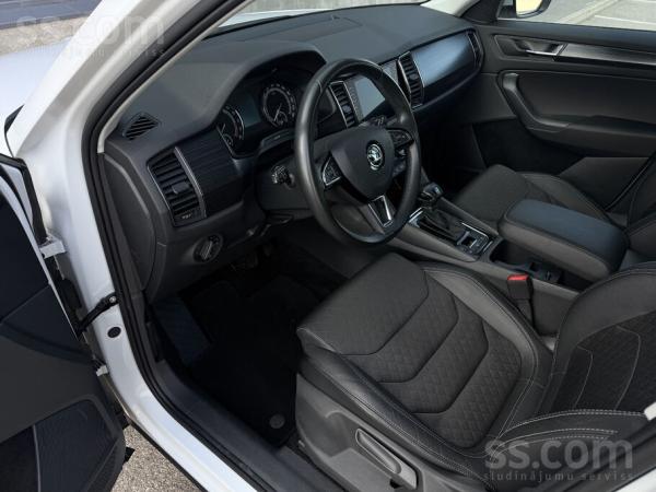 White Skoda Kodiaq 2019 in Riga, with an engine capacity of 2.00 L and mileage of 154 thousand km for 21850 €, photo 9 on AUTOMOTO.COM.LV