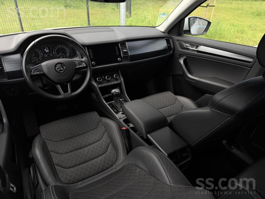 White Skoda Kodiaq 2019 in Riga, with an engine capacity of 2.00 L and mileage of 154 thousand km for 19990 €, photo 16 on AUTOMOTO.COM.LV