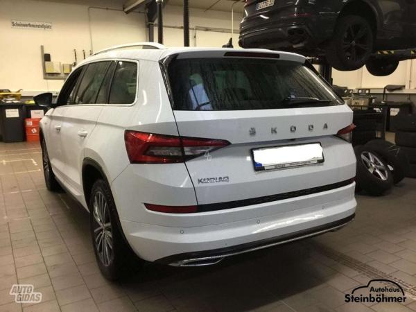 White Skoda Kodiaq 2020 in Kaunas, with an engine capacity of 2.00 L and mileage of 66 thousand km for 32535 €, photo 2 on AUTOMOTO.COM.LV