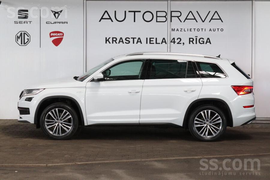 White Skoda Kodiaq 2020 in Riga, with an engine capacity of 2.00 L and mileage of 119 thousand km for 25800 €, photo 5 on AUTOMOTO.COM.LV