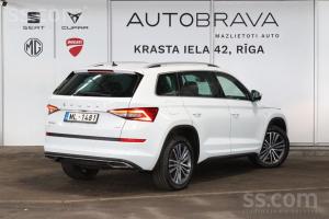White Skoda Kodiaq 2020 in Riga, with an engine capacity of 2.00 L and mileage of 119 thousand km for 25800 €, photo 7 on AUTOMOTO.COM.LV