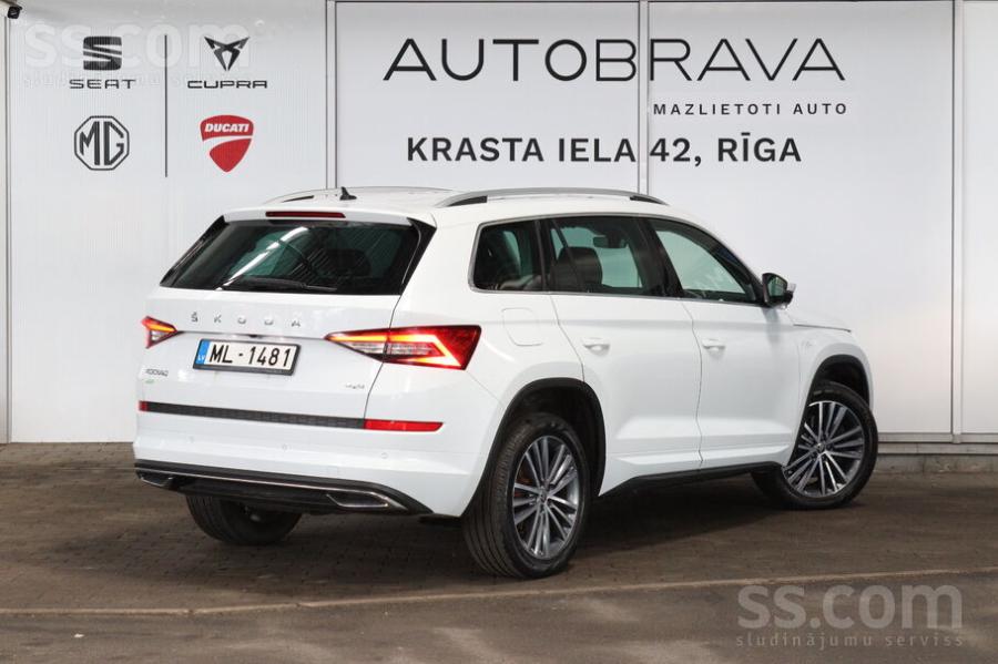 White Skoda Kodiaq 2020 in Riga, with an engine capacity of 2.00 L and mileage of 119 thousand km for 25800 €, photo 7 on AUTOMOTO.COM.LV