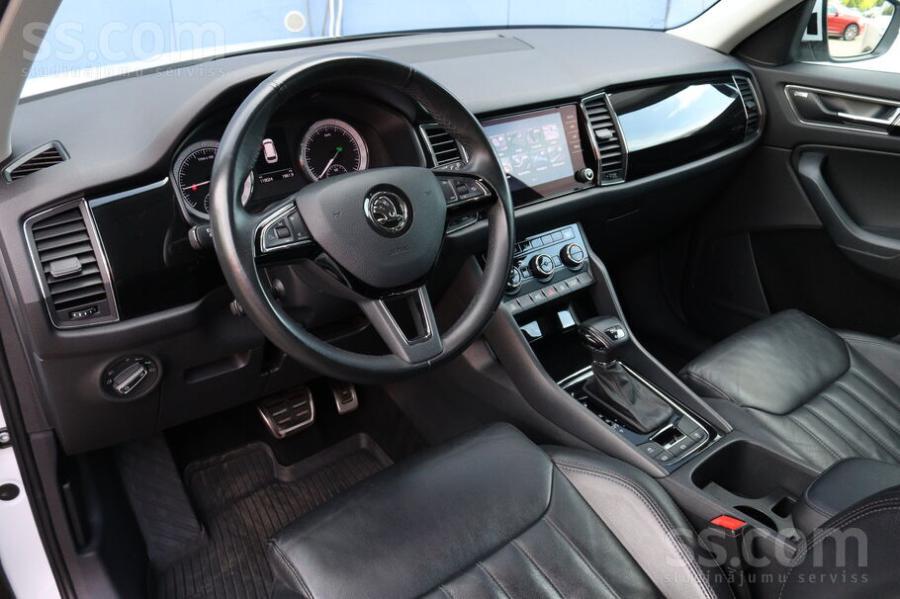 White Skoda Kodiaq 2020 in Riga, with an engine capacity of 2.00 L and mileage of 119 thousand km for 25800 €, photo 10 on AUTOMOTO.COM.LV