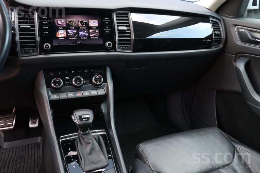 White Skoda Kodiaq 2020 in Riga, with an engine capacity of 2.00 L and mileage of 119 thousand km for 25800 €, photo 13 on AUTOMOTO.COM.LV