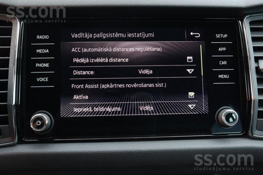 White Skoda Kodiaq 2020 in Riga, with an engine capacity of 2.00 L and mileage of 119 thousand km for 25800 €, photo 16 on AUTOMOTO.COM.LV