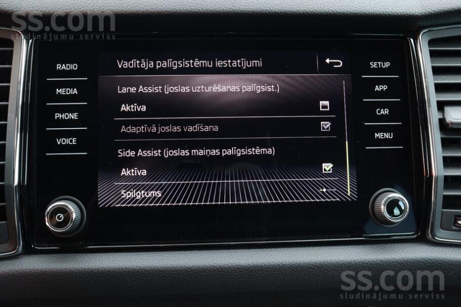White Skoda Kodiaq 2020 in Riga, with an engine capacity of 2.00 L and mileage of 119 thousand km for 25800 €, photo 17 on AUTOMOTO.COM.LV