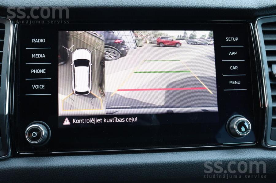 White Skoda Kodiaq 2020 in Riga, with an engine capacity of 2.00 L and mileage of 119 thousand km for 25800 €, photo 18 on AUTOMOTO.COM.LV