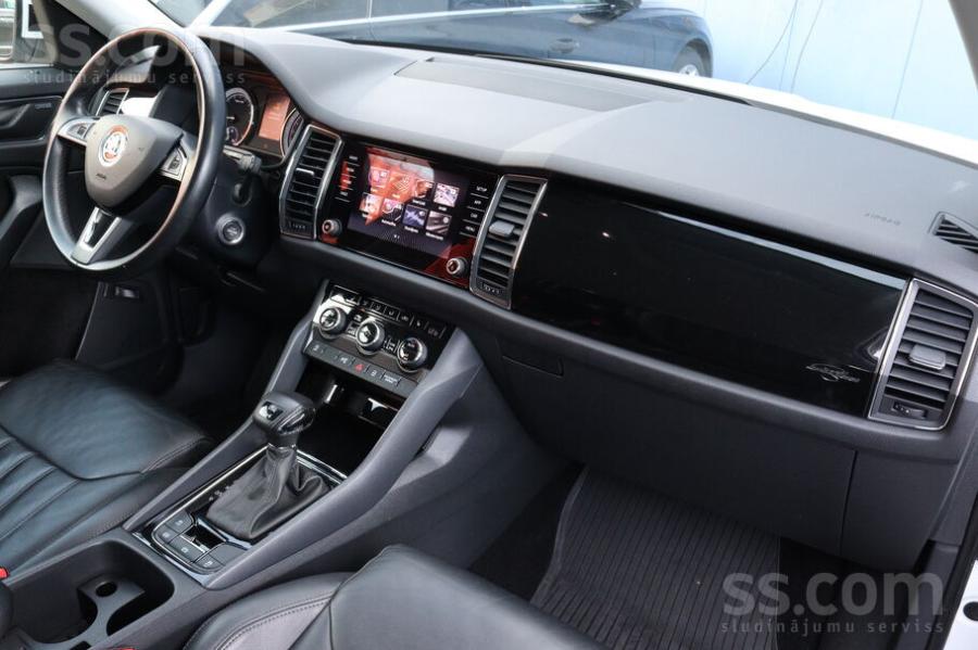 White Skoda Kodiaq 2020 in Riga, with an engine capacity of 2.00 L and mileage of 119 thousand km for 25800 €, photo 30 on AUTOMOTO.COM.LV