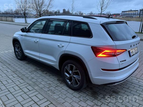 White Skoda Kodiaq 2021 in Liepaja, with an engine capacity of 2.00 L and mileage of 51 thousand km for 28300 €, photo 7 on AUTOMOTO.COM.LV