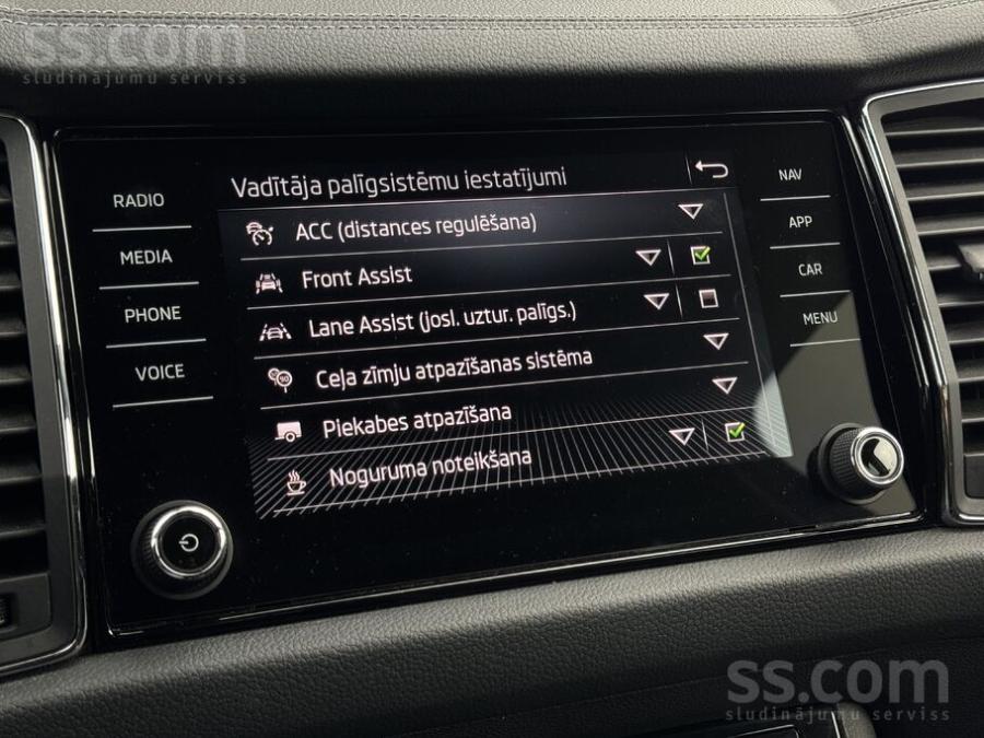 White Skoda Kodiaq 2021 in Valmiera, with an engine capacity of 2.00 L and mileage of 161 thousand km for 24500 €, photo 14 on AUTOMOTO.COM.LV