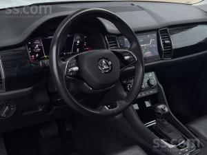 White Skoda Kodiaq 2021 in Valmiera, with an engine capacity of 1.50 L and mileage of 161 thousand km for 23800 €, photo 9 on AUTOMOTO.COM.LV