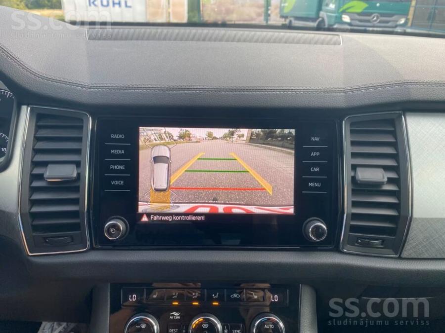 White Skoda Kodiaq 2022 in Liepaja, with an engine capacity of 2.00 L and mileage of 208 thousand km for 21500 €, photo 14 on AUTOMOTO.COM.LV