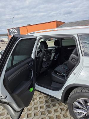 White Skoda Kodiaq 2023 in Kaunas, with an engine capacity of 2.00 L and mileage of 55 thousand km for 30999 €, photo 12 on AUTOMOTO.COM.LV