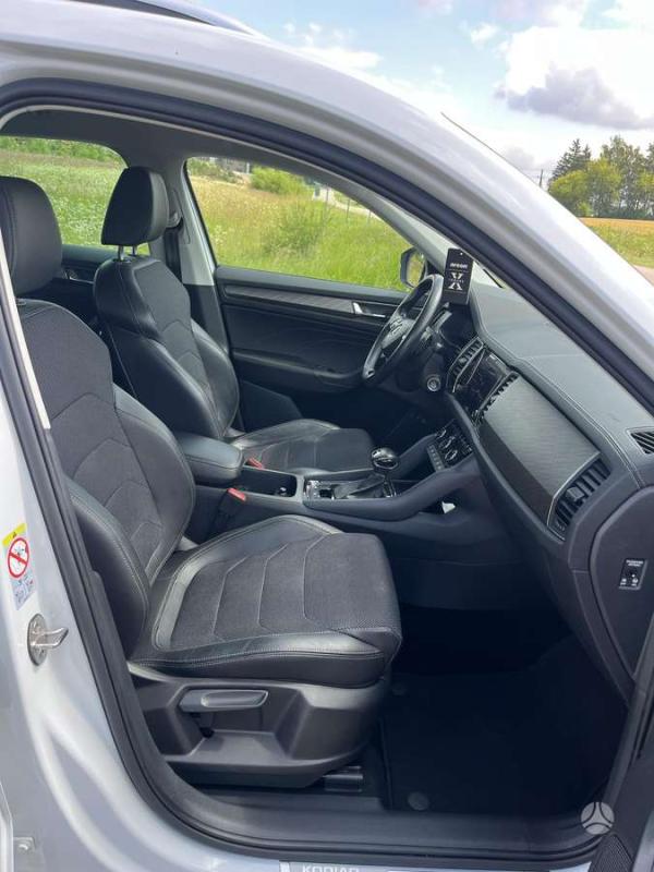 White Skoda Kodiaq 2023 in Panevezys, with an engine capacity of 1.97 L and mileage of 197 thousand km for 19900 €, photo 6 on AUTOMOTO.COM.LV