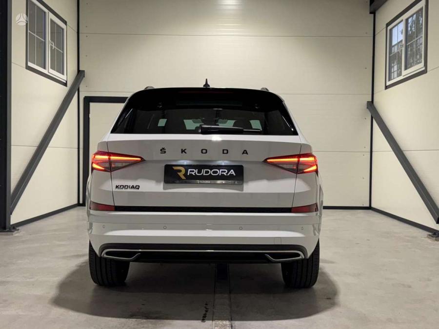 White Skoda Kodiaq 2023 in Siauliai, with an engine capacity of 1.97 L and mileage of 135 thousand km for 28800 €, photo 6 on AUTOMOTO.COM.LV