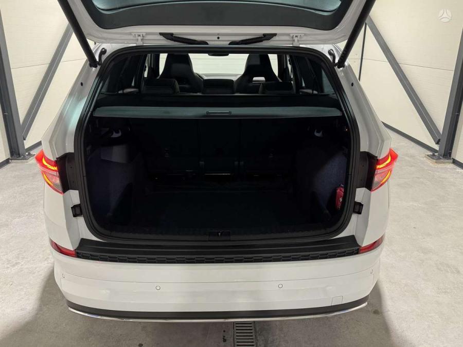 White Skoda Kodiaq 2023 in Siauliai, with an engine capacity of 1.97 L and mileage of 135 thousand km for 28800 €, photo 14 on AUTOMOTO.COM.LV