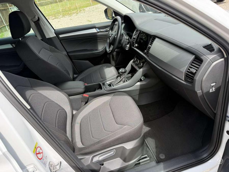White Skoda Kodiaq 2023 in Marijampole, with an engine capacity of 1.50 L and mileage of 171 thousand km for 21538 €, photo 15 on AUTOMOTO.COM.LV