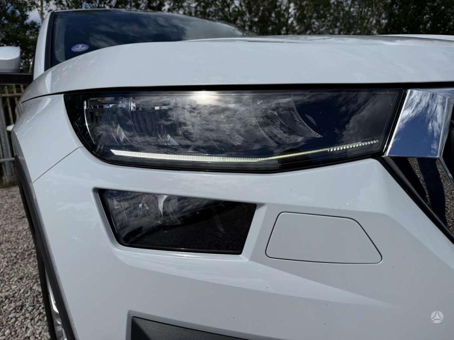 White Skoda Kodiaq 2023 in Marijampole, with an engine capacity of 1.50 L and mileage of 171 thousand km for 21538 €, photo 23 on AUTOMOTO.COM.LV
