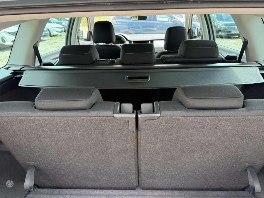 White Skoda Kodiaq 2023 in Marijampole, with an engine capacity of 1.50 L and mileage of 171 thousand km for 21538 €, photo 24 on AUTOMOTO.COM.LV