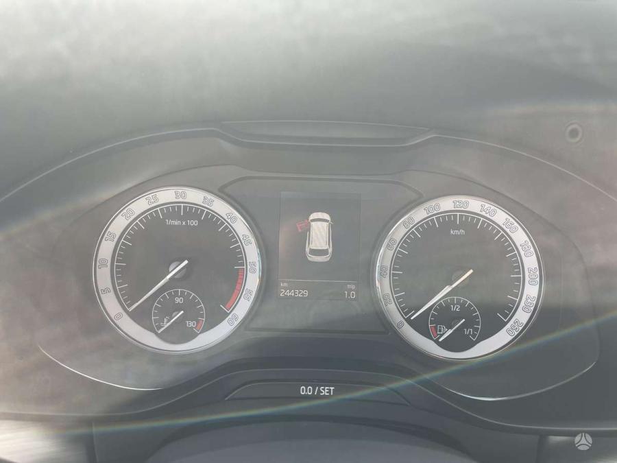 White Skoda Kodiaq 2020 in Taurage, with an engine capacity of 2.00 L and mileage of 245 thousand km for 14500 €, photo 18 on AUTOMOTO.COM.LV