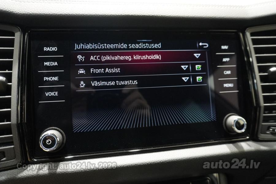 Белый Шкода Kodiaq 2021 в Таллин, объемом двигателя 2.00 л и пробегом 82 тыс. км за 31900 €, фото 22 на AUTOMOTO.COM.LV
