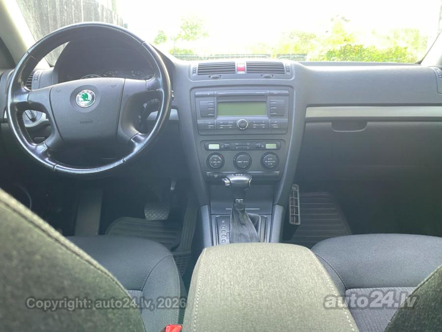 Beige Skoda Octavia 2008 in Tallinn, with an engine capacity of 1.90 L and mileage of 295 thousand km for 3499 €, photo 14 on AUTOMOTO.COM.LV