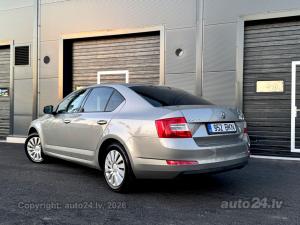 Beige Skoda Octavia 2014 in Tallinn, with an engine capacity of 2.00 L and mileage of 220 thousand km for 6499 €, photo 4 on AUTOMOTO.COM.LV