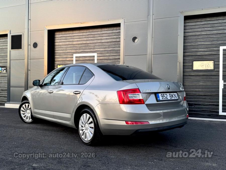 Beige Skoda Octavia 2014 in Tallinn, with an engine capacity of 2.00 L and mileage of 220 thousand km for 6499 €, photo 4 on AUTOMOTO.COM.LV